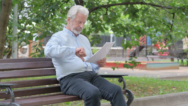 Senior Old Man Feeling Upset while Reading Contract Outdoor Stock Image ...