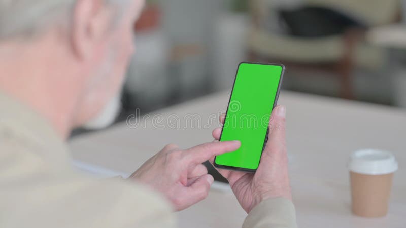 Old Man Using Smartphone with Green Screen Stock Photo - Image of ...