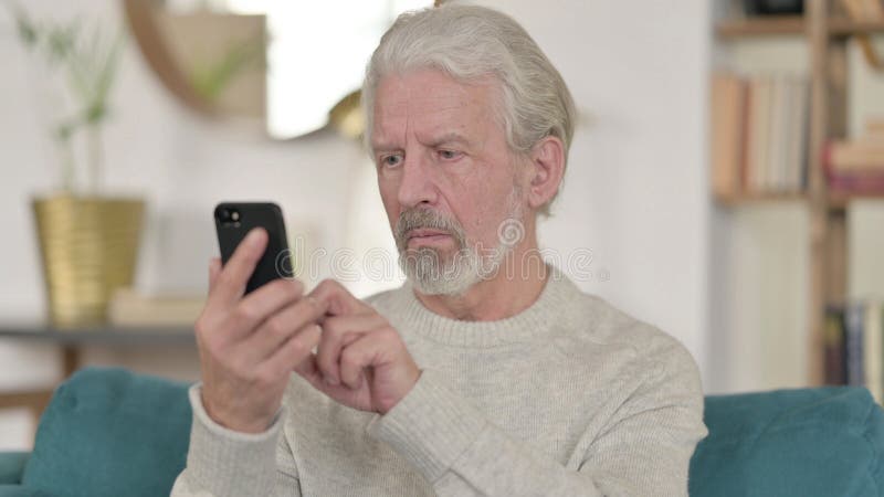 Senior Old Man Using Smartphone at Home Stock Image - Image of ...