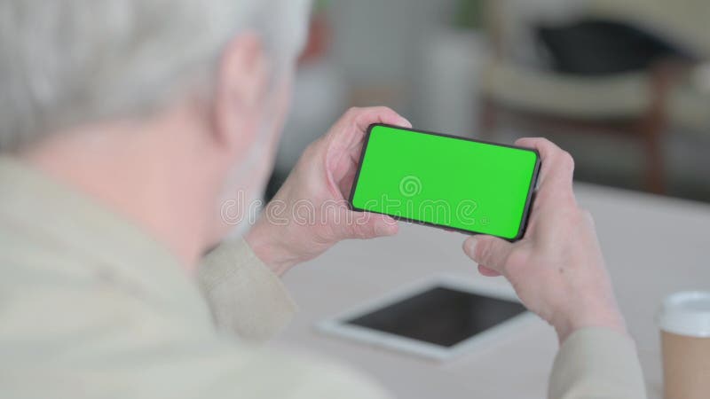 Old Man Watching Smartphone with Chroma Screen Stock Image - Image of ...