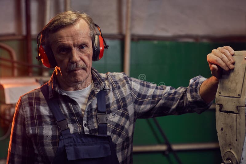 Senior operator at work stock photo. Image of engineer - 166370624