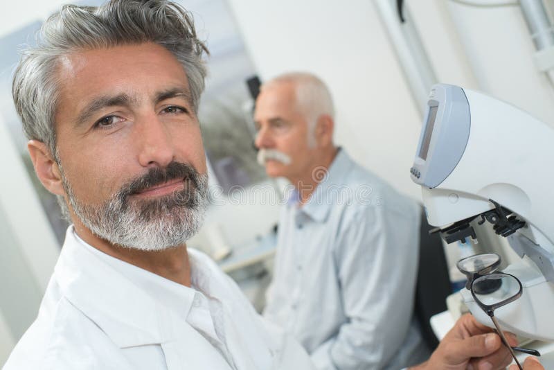 Senior Ophthalmologist at Work in Eye Clinic Stock Image - Image of ...