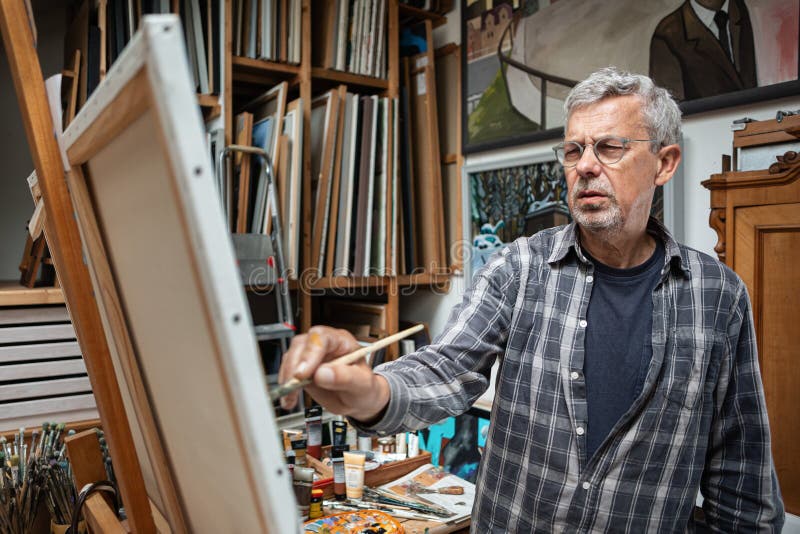 Senior Artist Painting on Canvas in His Studio Stock Image - Image of ...