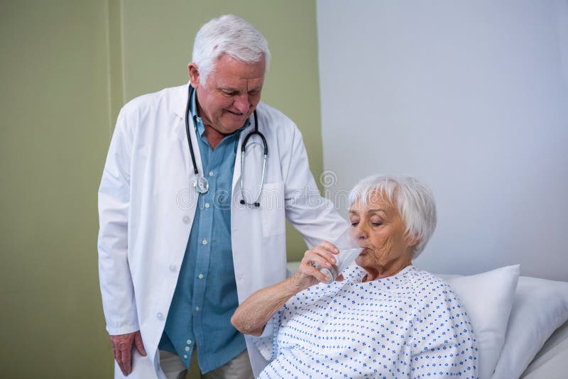 Patient Drinking Water while Having Meal Stock Photo - Image of male ...