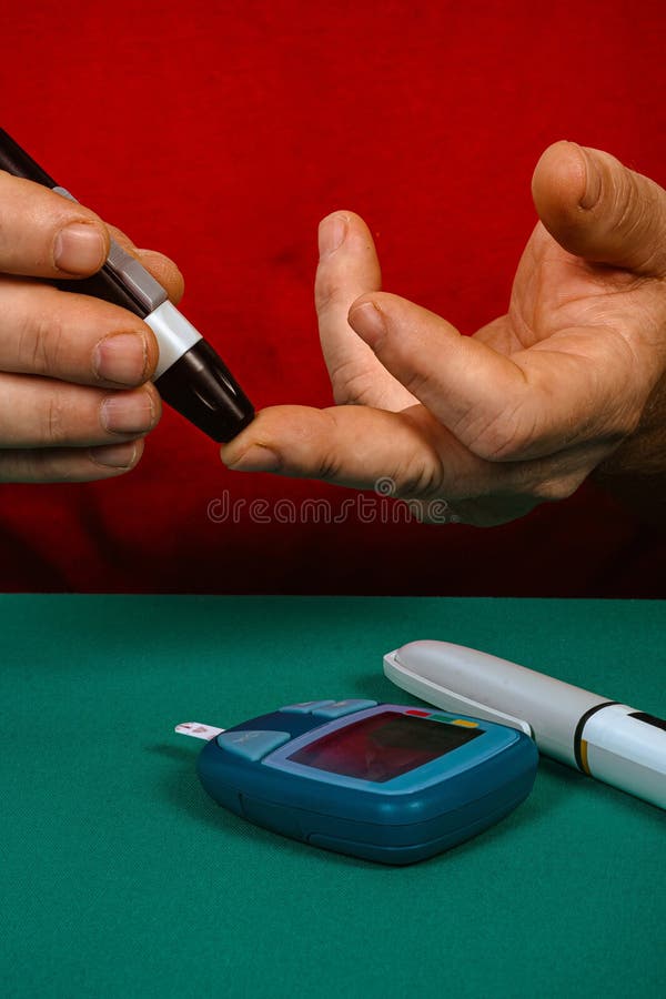 Patient Using Lancet for Blood Glucose Test with Glucometer and Insulin ...