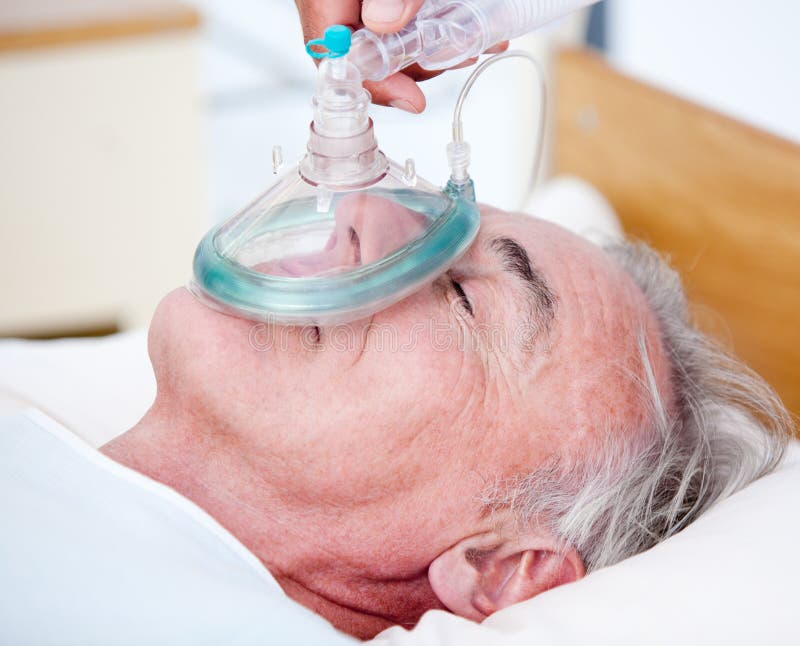 Senior Patient Receiving Oxygen Mask Stock Photo - Image of equipment ...