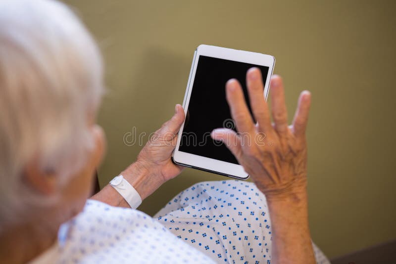 Senior Patient Using Digital Tablet To Video Chat Stock Image - Image ...