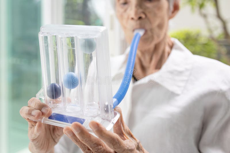 Senior Patient Using Incentive Spirometer,tool To Help the Lung ...
