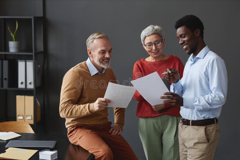 Senior People Collaborating on Project in Office Stock Image - Image of ...
