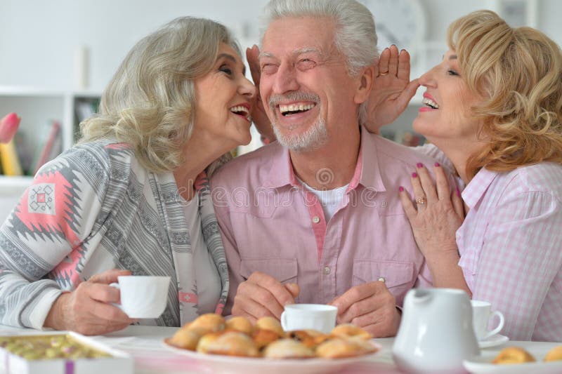 Senior people drinking tea stock image. Image of positive - 117735947