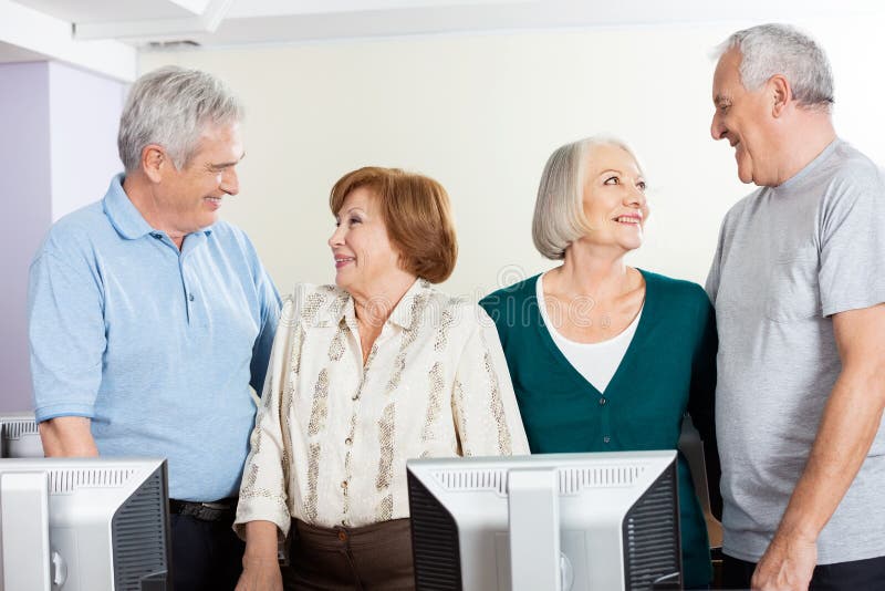 Senior People Looking at Each Other in Computer Class Stock Photo ...