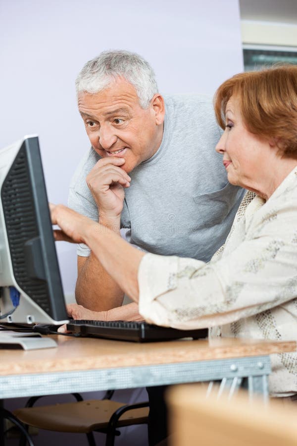 Senior People Using Computer in Class Stock Photo - Image of friend ...