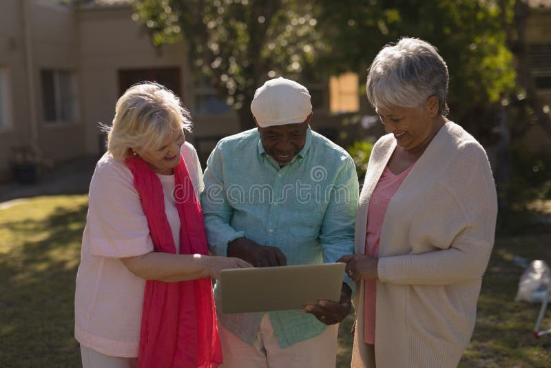 Senior People Using Laptop in the Park Stock Image - Image of female ...