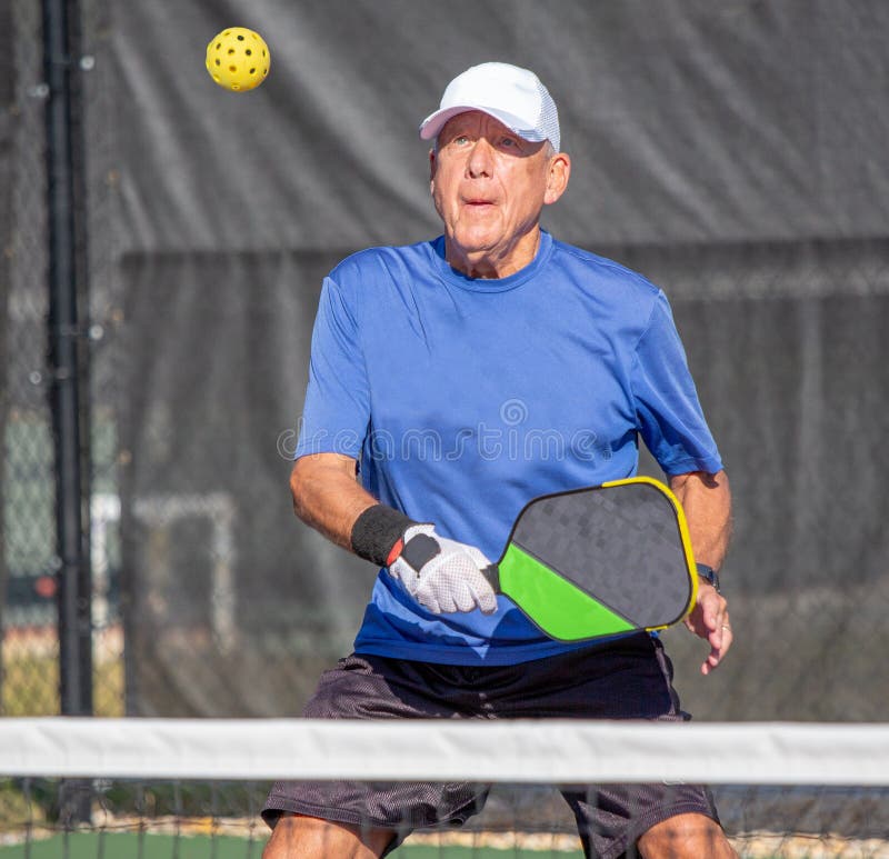 Senior Pickleball Player with His Eye on the Ball Stock Photo - Image ...