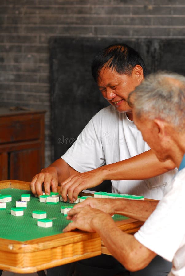 People playing mahjong editorial stock image. Image of house - 20263134