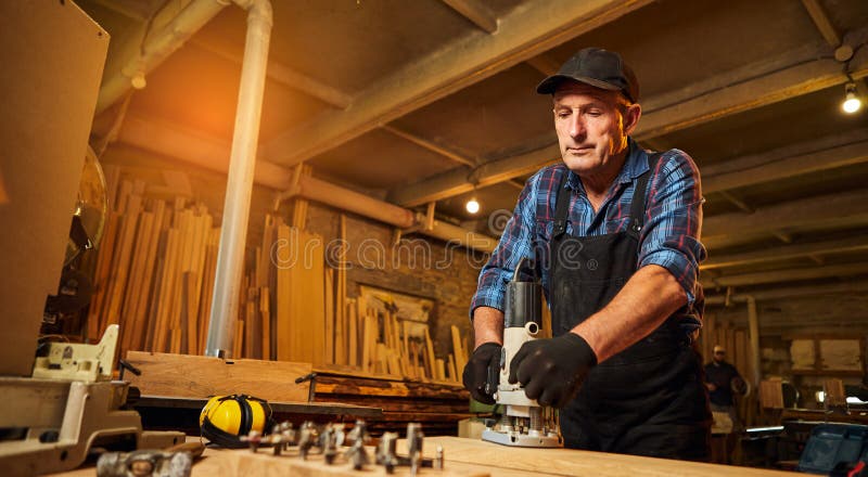 Senior Professional Carpenter in Uniform Working of Manual Milling ...