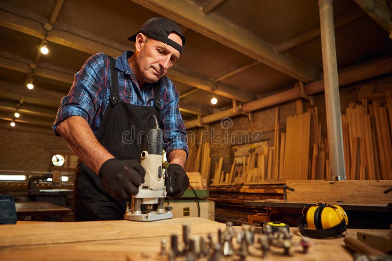 Senior Professional Carpenter in Uniform Working of Manual Milling ...