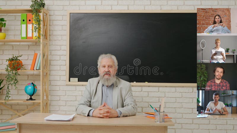 Senior Professor Delivering Online Lecture from Classroom Setting Stock ...