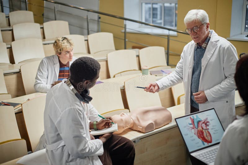 Senior Professor Teaching CPR Stock Image - Image of medical, school ...