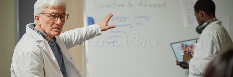 Senior Professor Teaching Medicine in Class Header Image Stock Image ...