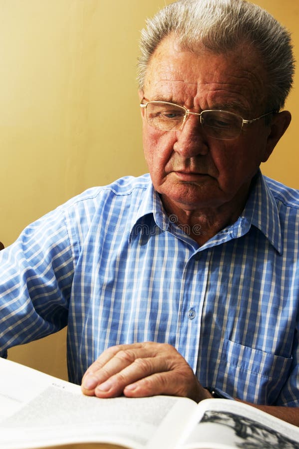 Senior reading book stock photo. Image of adult, night - 6423396