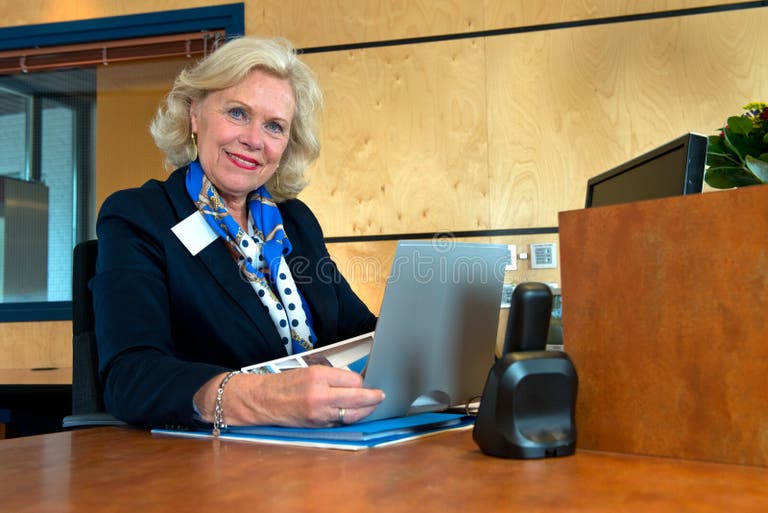 Senior receptionist stock photo. Image of folder, check - 55858816