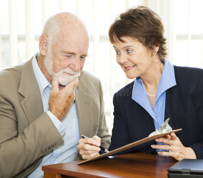 Senior Reluctant To Sign Contract Stock Image - Image of finance ...