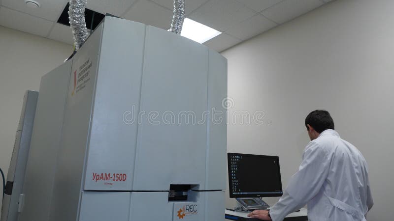 Senior Researche Rusing a Computer in the Lab while Working on an ...