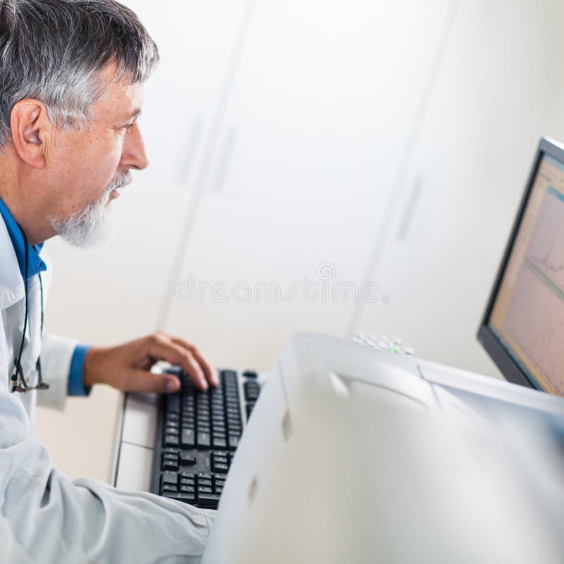 Senior Researcher Using a Computer in the Lab Stock Image - Image of ...