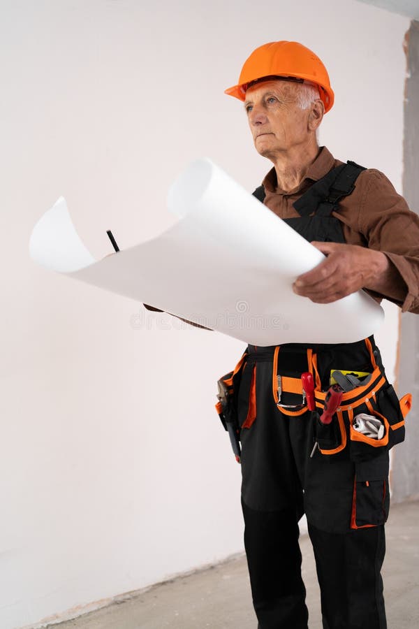 Senior Retired Architect Builder Holding Plan of Rooms. Civil Engineer ...