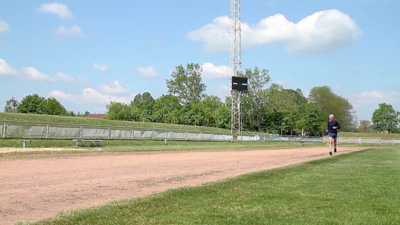 Senior Runner Running on the Sport Court Stock Footage - Video of ...