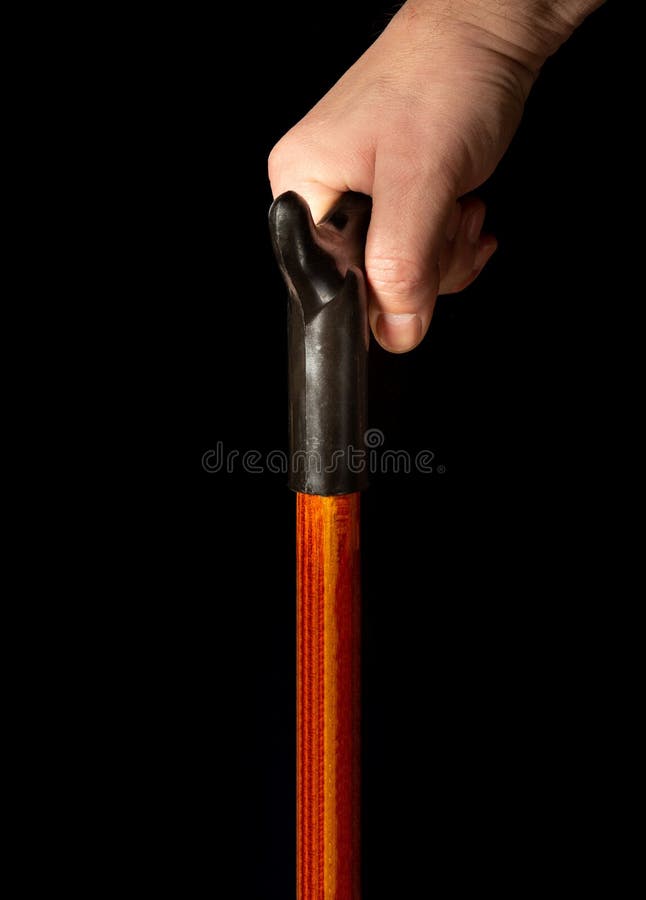 Senior`S Hand Walking with Cane Close Up on Black Background Stock ...