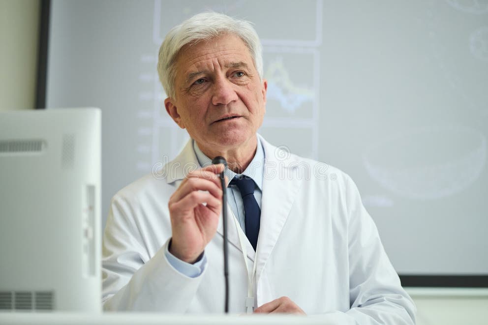 Senior Scientist Delivering Presentation at Conference Stock Image ...