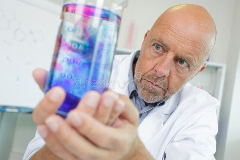 Senior Scientist Holding Flask Stock Photo - Image of medicine, chemist ...