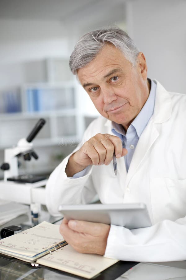 Senior Scientist in Laboratory Stock Image - Image of analyzing ...