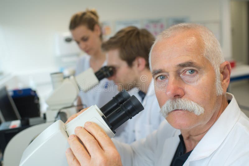 Senior Scientist at Work in Laboratory Stock Photo - Image of cure ...