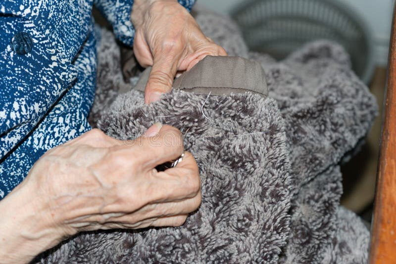 Senior sewing stock photo. Image of arthritis, hobby - 71144644