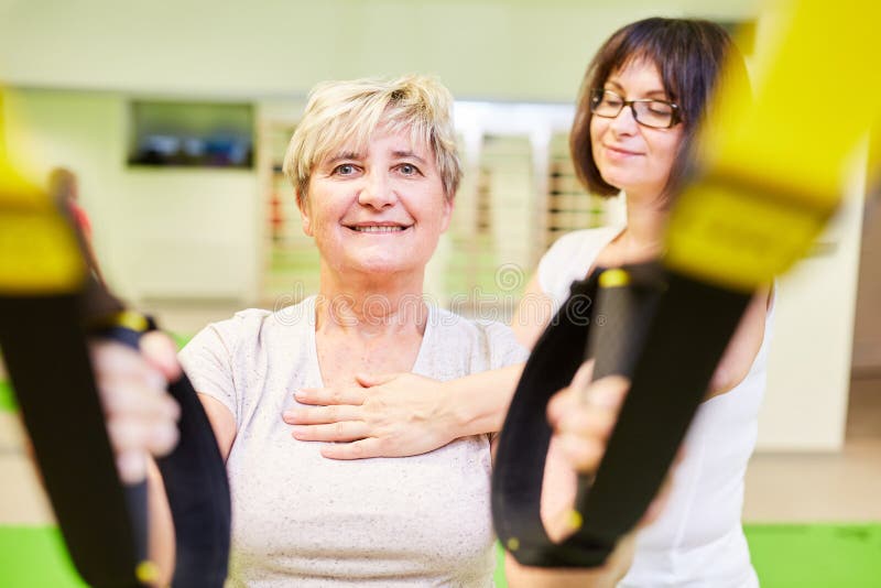 Senior in Sling Training in Physiotherapy Stock Image - Image of ...