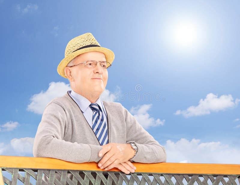 Senior Smiling Man on a Bench Posing Outside Stock Image - Image of ...
