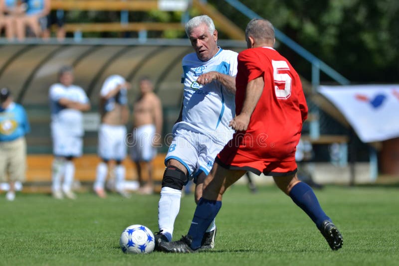 Senior soccer game editorial photography. Image of agression - 27457262
