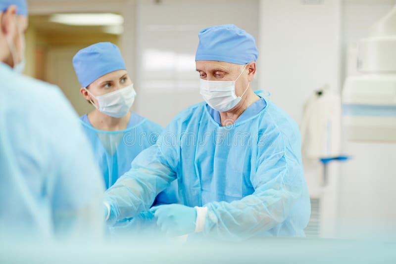 Senior Specialist Performing Operation Stock Photo - Image of hospital ...