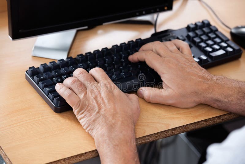 Senior Student Using Computer in Classroom Stock Image - Image of ...
