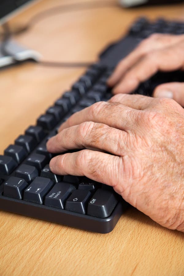 Senior Student Using Keyboard in Classroom Stock Photo - Image of ...