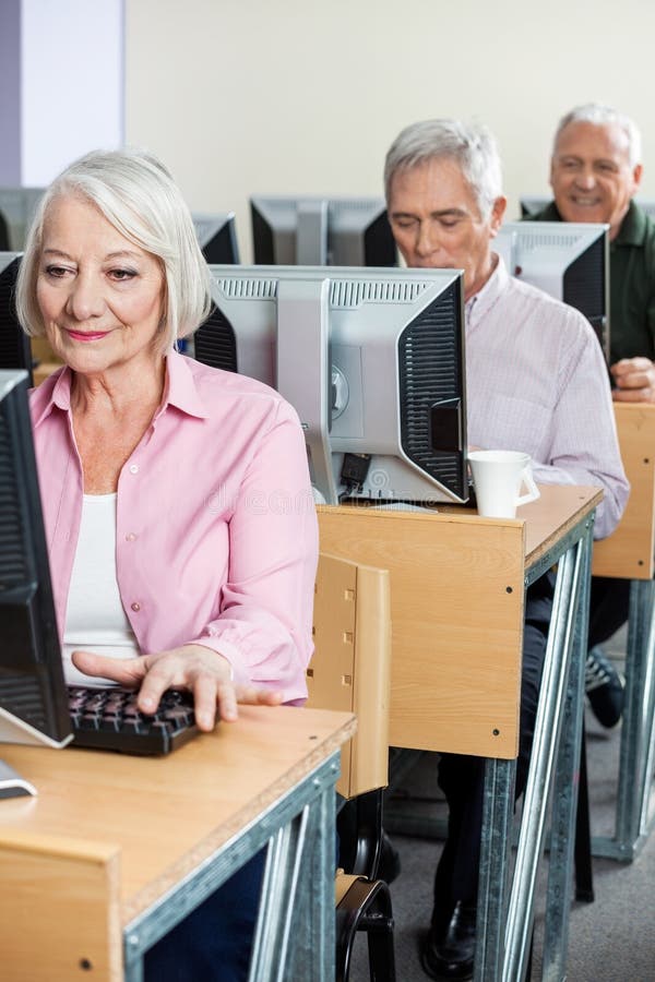 Senior Students Using Computers in Classroom Stock Image - Image of ...