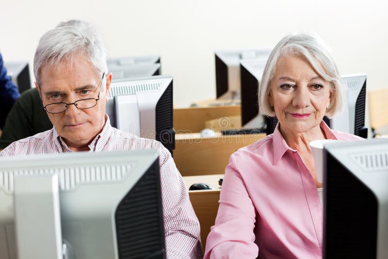 Senior Students Using Computers in Classroom Stock Photo - Image of ...