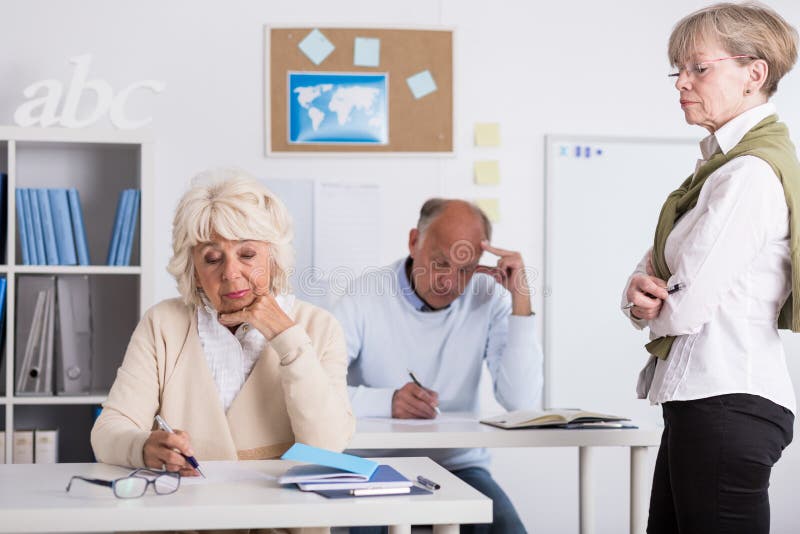 Senior Students Writing Test Stock Photo - Image of learn, retired ...