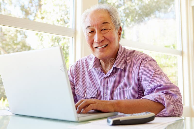 Senior Taiwanese Man Working on Laptop Stock Image - Image of ...