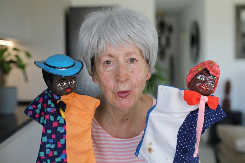 Senior Teacher Holding Some Cute Puppets Stock Image - Image of control ...