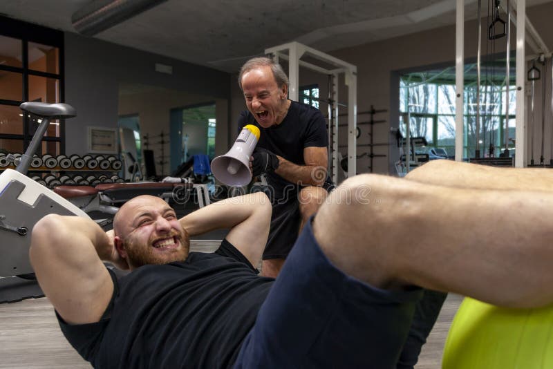 Senior Trainer Screaming with a Megaphone at the Young Athlete Stock ...