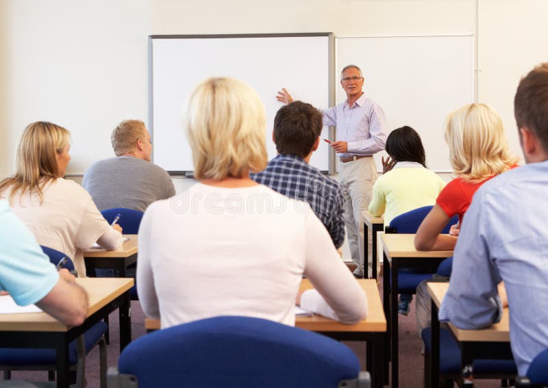 Senior Tutor Teaching Class Stock Photo - Image of female, education ...